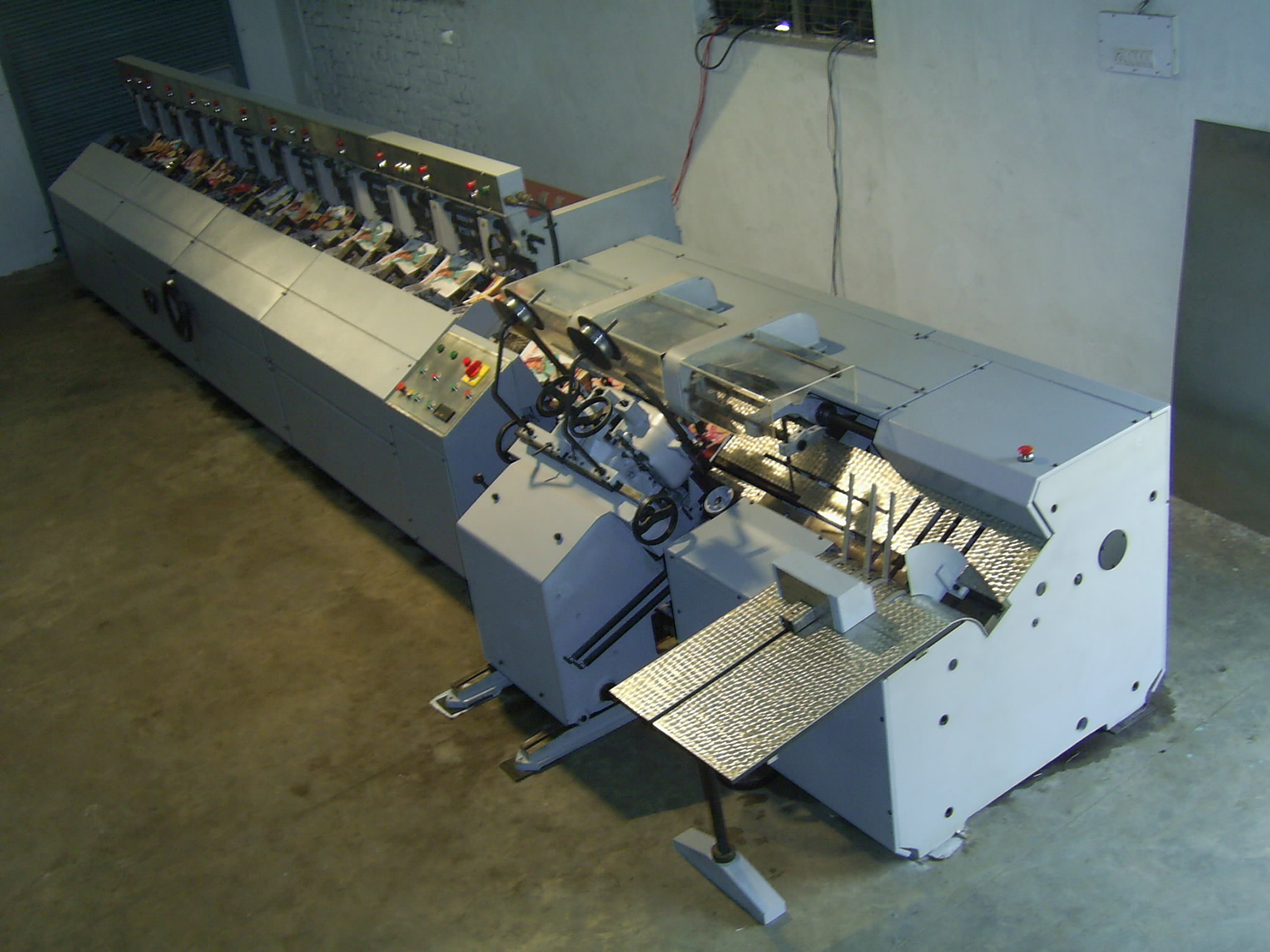 Home - Side Gathering Machine Manufacture in India.